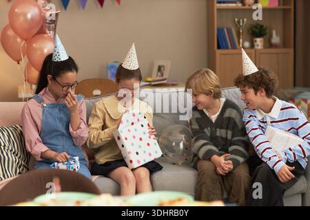 A group of children at birthday party at home Stock Photo - Alamy