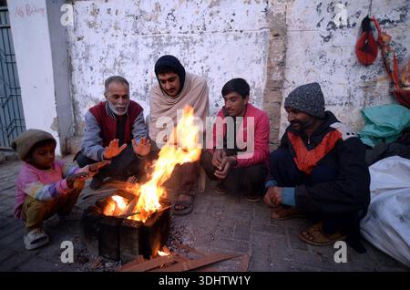 People are warming their hands on bone-fire to save themselves from ...