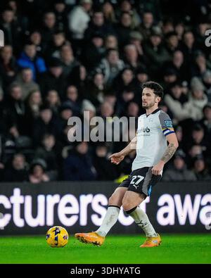 Lewis Travis of Derby County passes the ball during the Sky Bet ...