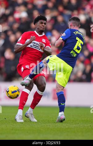 Jordan Thompson of Preston North End slide tackles Darnell Furlong of ...