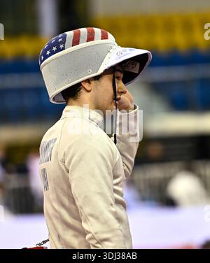 Doha, Qatar. 24th Jan, 2026. Ievgen Makiienko of Ukraine and Abdelbaky ...