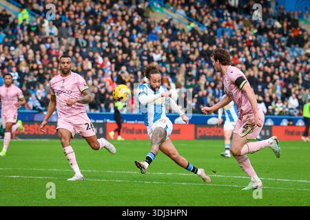 Huddersfield Town midfielder Marcus Harness (10) scores a GOAL 1-0 and ...