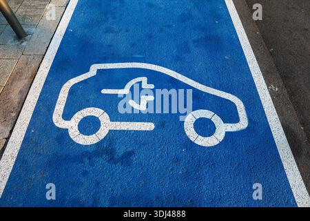 20 January 2026, Saxony, Schkeuditz: Blue parking spaces are marked in ...