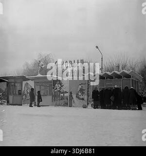 Citizens shop for New Year decorations at a supermarket in Nanjing City ...