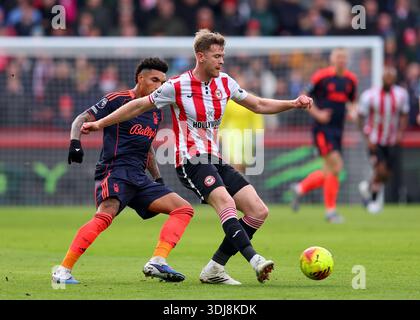 Nathan Collins of Brentford passes the ball during the Brentford v ...