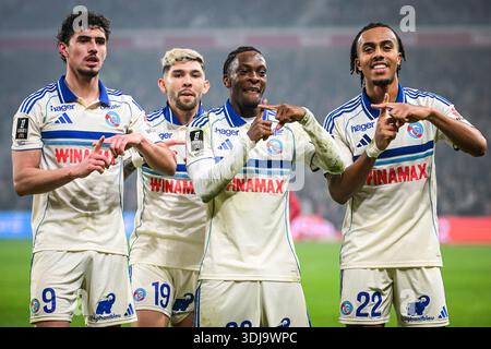 Martial GODO of Strasbourg celebrate his goal with teammates during the ...