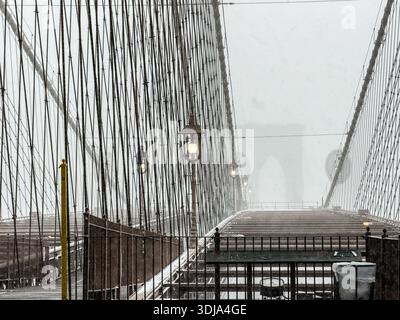 Brooklyn Bridge is seen covered with snow during a snowstorm in New ...