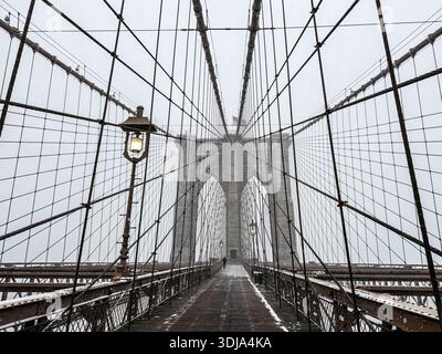 Brooklyn Bridge is seen covered with snow during a snowstorm in New ...