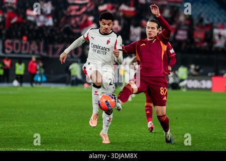 Zachary Athekame of AC Milan and Daniele Ghilardi of AS Roma during AS ...