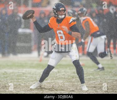 Denver Broncos quarterback Jarrett Stidham (8) warms up during an NFL ...