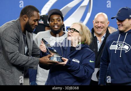 Seattle Seahawks chair Jody Allen celebrates with the trophy after the ...