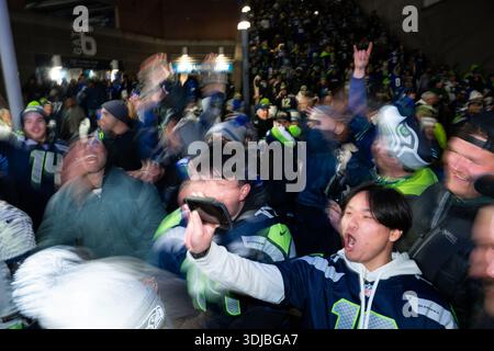 Seattle, USA. 25th Jan 2026. Fans spill into the streets celebrating ...