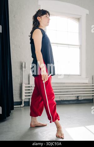 female dancer barefoot in dance position isolated Stock Photo - Alamy