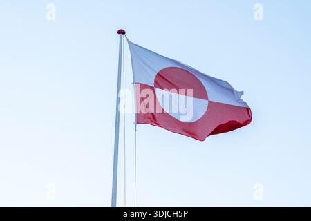 Nuuk, Greenland 20260125. A Greenlandic flag flutters in the wind in ...
