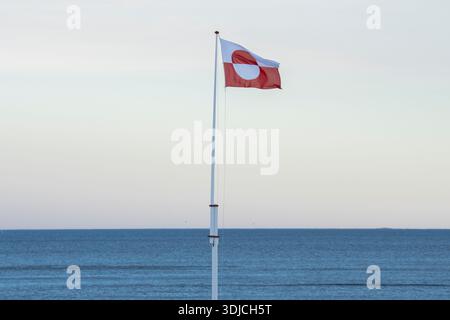 Nuuk, Greenland 20260125. A Greenlandic flag flutters in the wind in ...