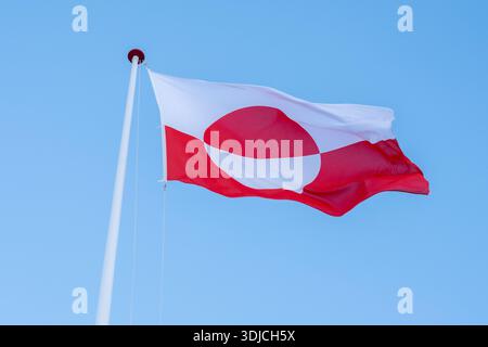 Nuuk, Greenland 20260125. A Greenlandic flag flutters in the wind in ...