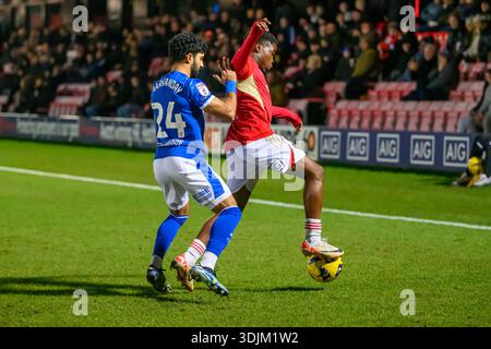 Dilan Markanday of Chesterfield FC tackles Kelly Nmai of Salford City ...