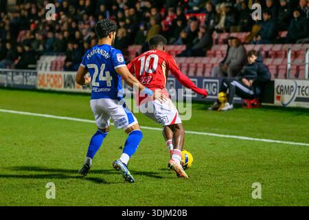 Dilan Markanday of Chesterfield FC tackles Kelly Nmai of Salford City ...