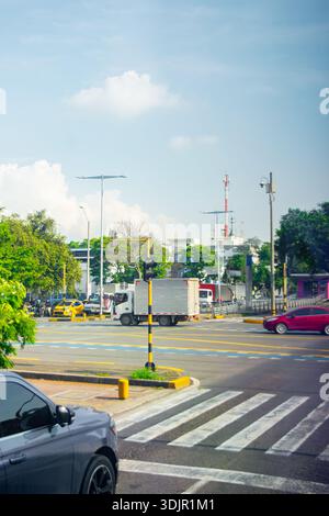 A bustling city intersection featuring modern glass skyscrapers, mid ...
