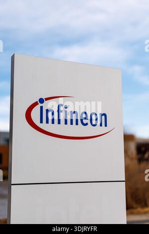 Neubiberg, Germany. 28th Jan, 2026. The Infineon lettering and logo can ...