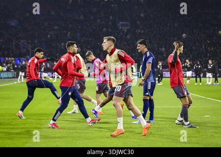 AMSTERDAM – Players of Olympiakos Piraeus take to the pitch for the ...