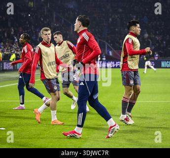 AMSTERDAM – Players of Olympiakos Piraeus take to the pitch for the ...