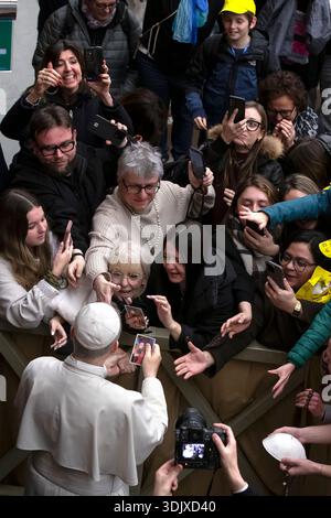Pope Leo XIV greets the faithful during his weekly general audience in ...