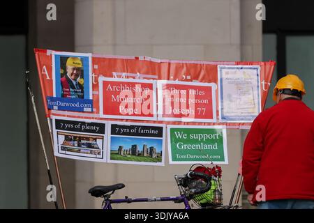 A man looks at a banner outside St Paul's Cathedral during Dame Sarah ...