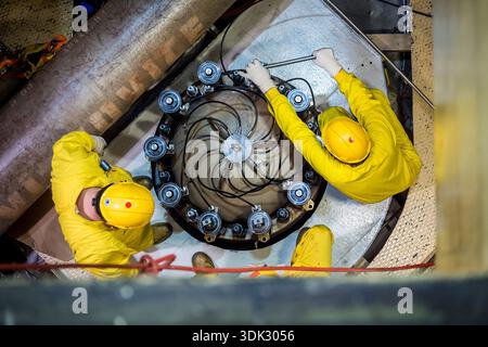 Dukovany Nuclear Power Plant workers during inspection and maintenance ...