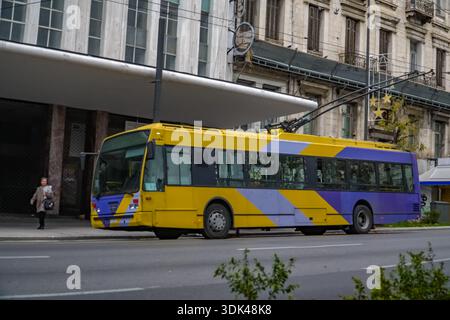 Athens trolleybus (trackless trolley) in yellow and purple livery ...