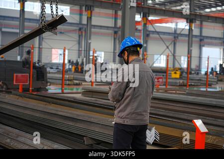 Steel mill workers command their work during operations Stock Photo - Alamy