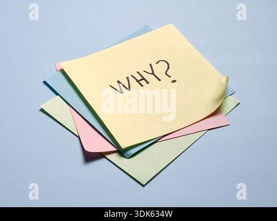 Stack of colorful sticky notes with handwritten why text for ...