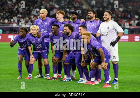 Qatar starting players pose for a team photo at the beginning of the ...