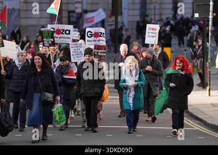 People take part in a Palestine Coalition march in central London ...