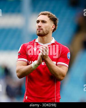 Sam Smith of Wrexham applauds the fans after the final whistle during ...