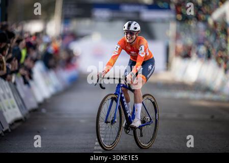 Dutch Lucinda Brand celebrates as she crosses the finish line to win ...