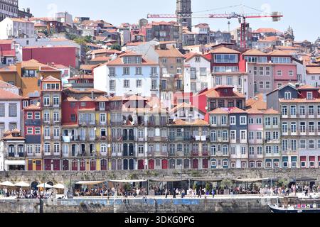 Porto Ribeira district facades featuring balconies, windows, and ...