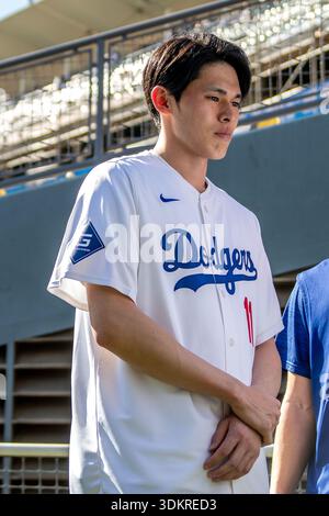 Los Angeles Dodgers' Roki Sasaki throws during the first inning of a ...