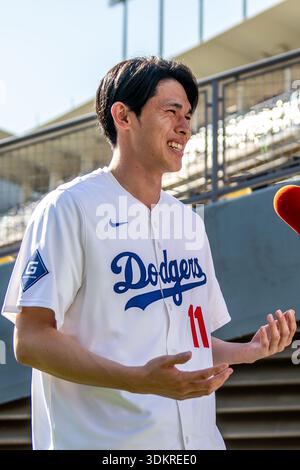 Los Angeles Dodgers' Roki Sasaki throws during the first inning of a ...