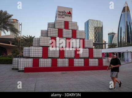 A man walks past a model of Web Summit 2026, the world's largest ...