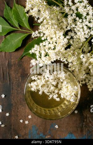 Elderflower blossoms and fresh green leaves, a natural ingredient for ...