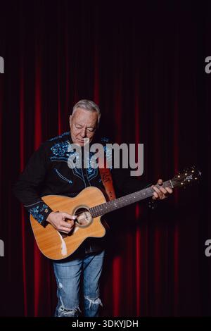 Australian guitarist Tommy Emmanuel performs live during a concert at ...