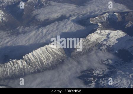Swiss Alpes with snowy mountain tops aerial view towards the east ...