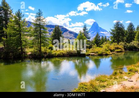 View of Grindji Lake (Grindjisee) and Matterhorn mountain at summer on ...