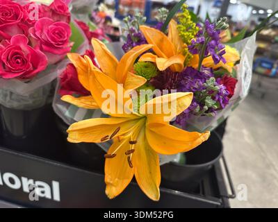 Fresh flower bouquets are displayed for sale at a Walmart store in ...