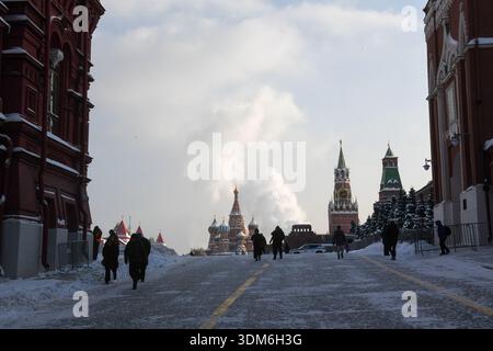 People walk along the Red Square near the Moscow Kremlin Stock Photo ...