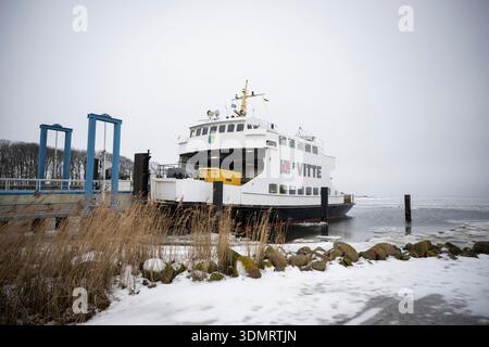 Vitte, Germany. 07th Feb, 2026. Handcarts stand in the ice in the port ...