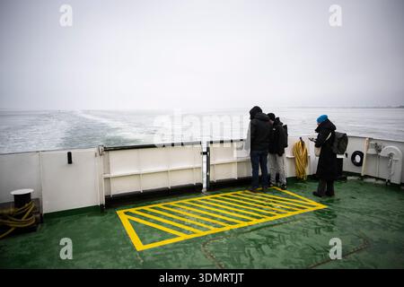 Vitte, Germany. 07th Feb, 2026. Handcarts stand in the ice in the port ...