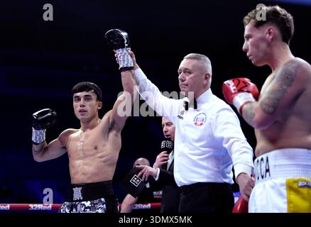 Lucas Szeto-Biswana celebrates victory against Liam Macmillan following ...