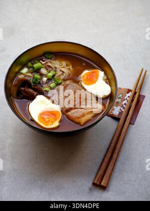 Bowl of soup with onions served at a restaurant Stock Photo - Alamy